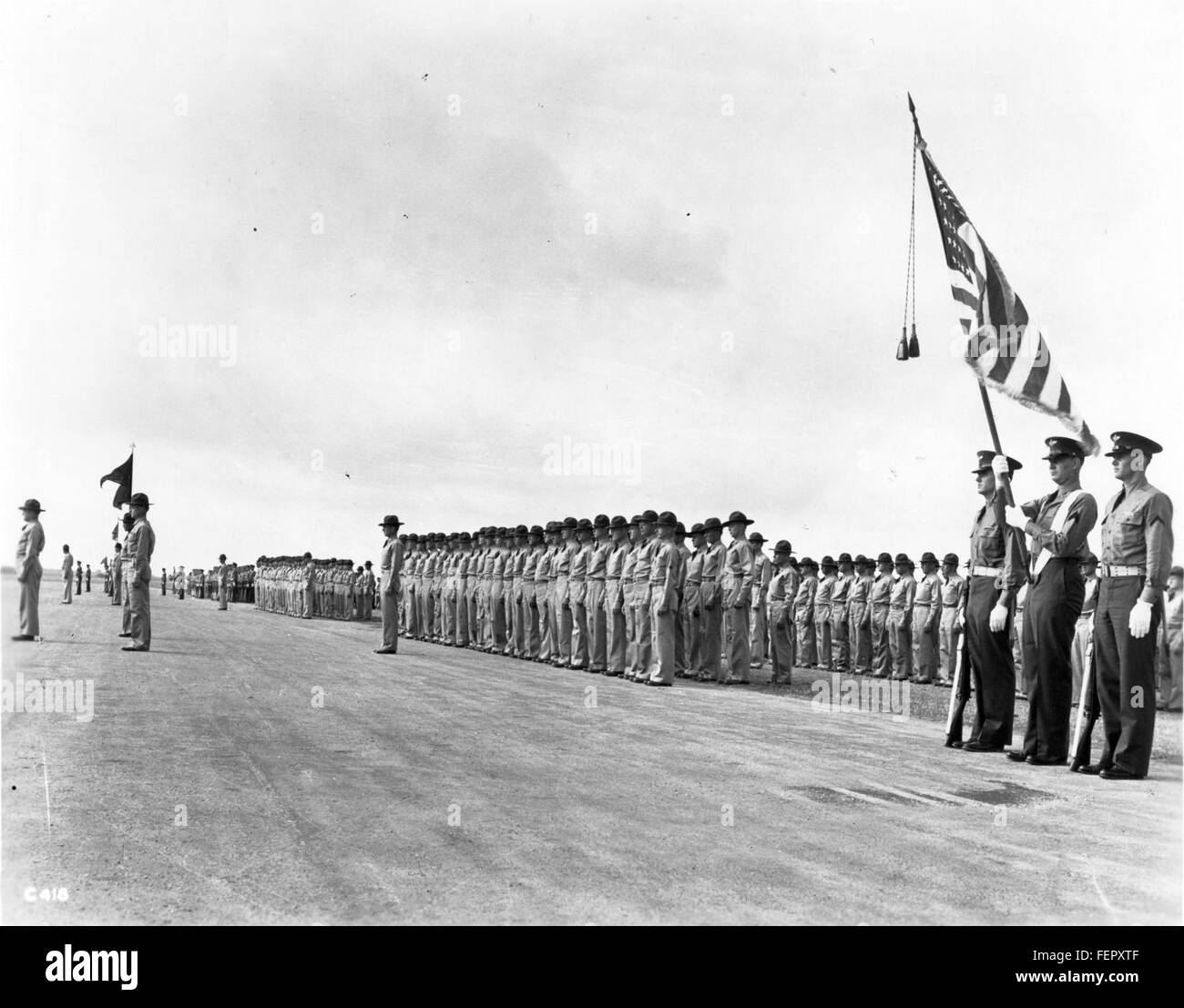 This image shows a group of cadets undergoing inspection, reflecting ...