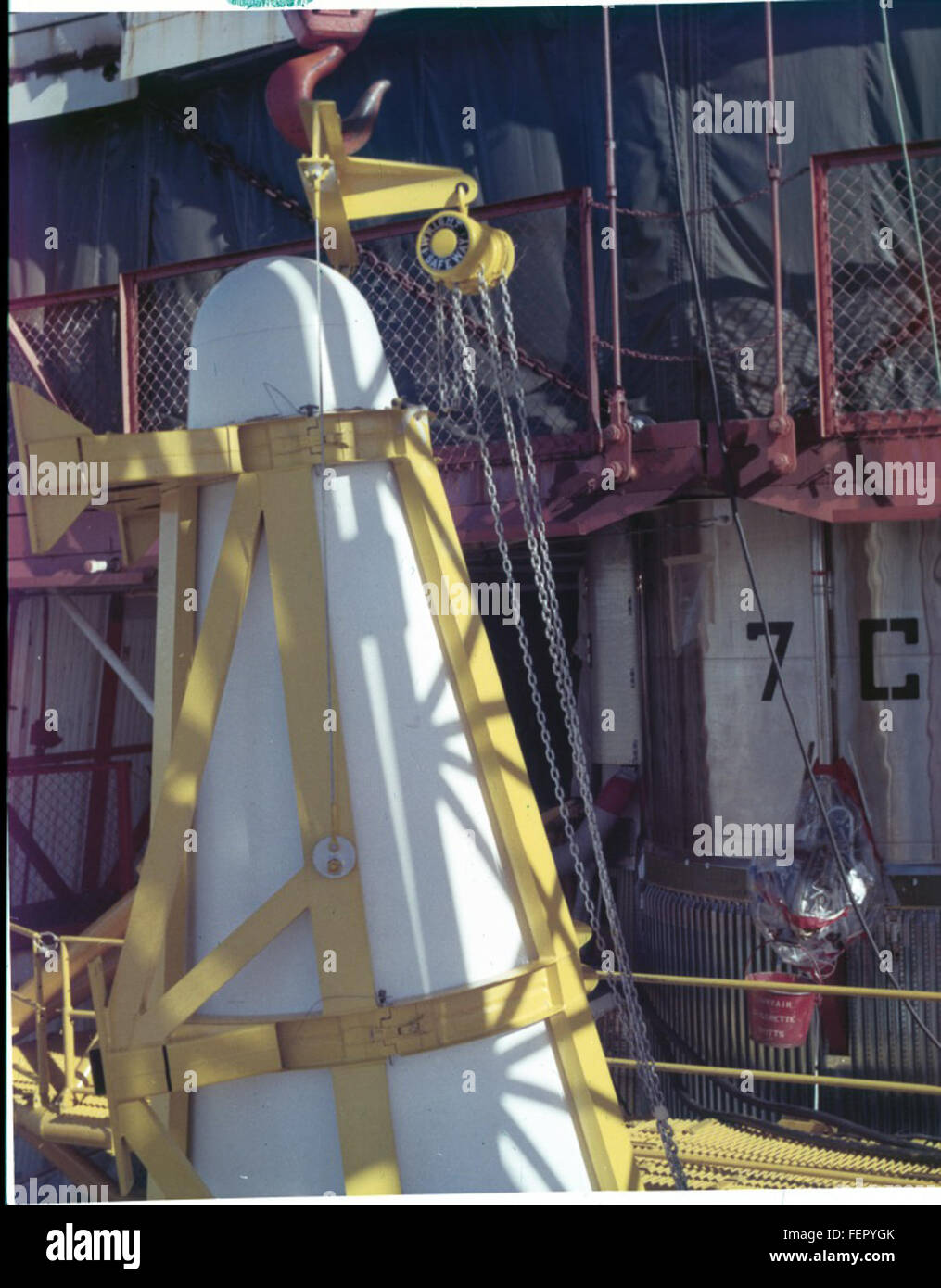 This image shows the Atlas 7C rocket with a General Electric re-entry ...