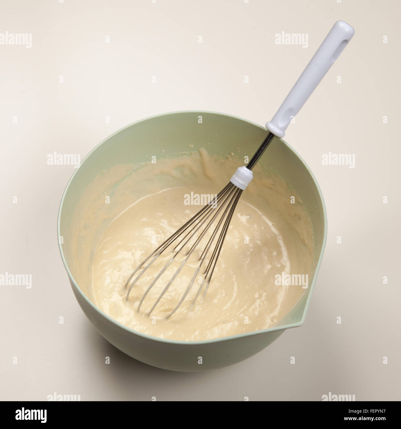 Preparing batter for pancakes Stock Photo - Alamy