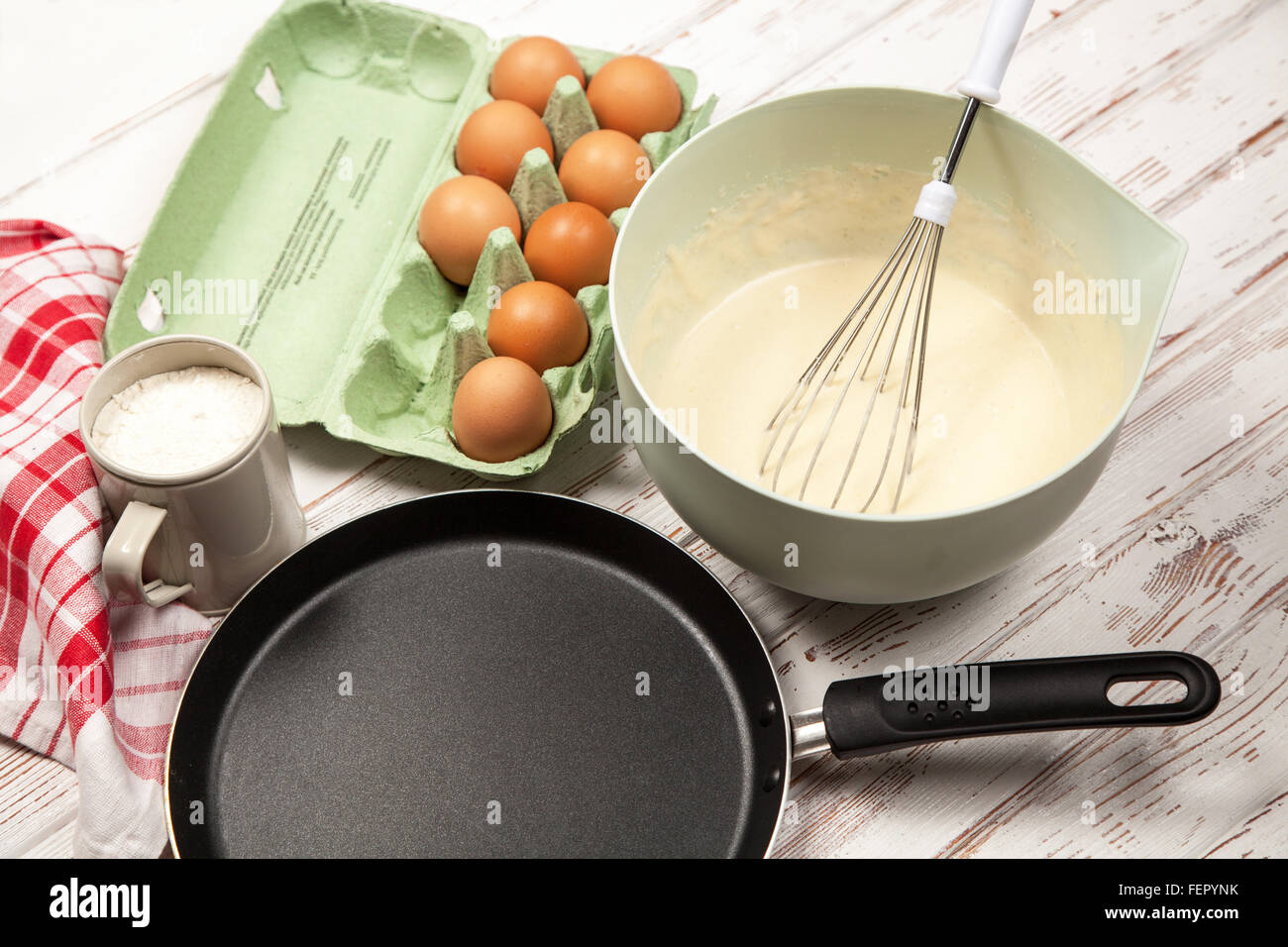 Preparing batter for pancakes Stock Photo - Alamy
