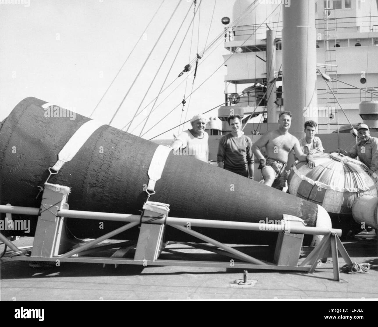 The Atlas 8C, with its GE RVX-2 nose cone, is shown being hoisted into ...
