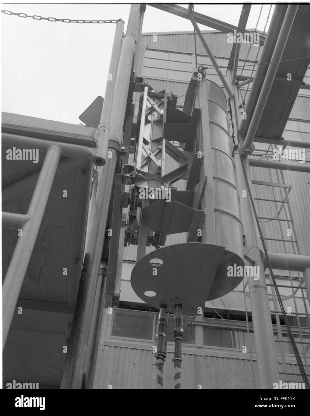 This detailed close-up shows the piggyback pod mechanism, a design used ...