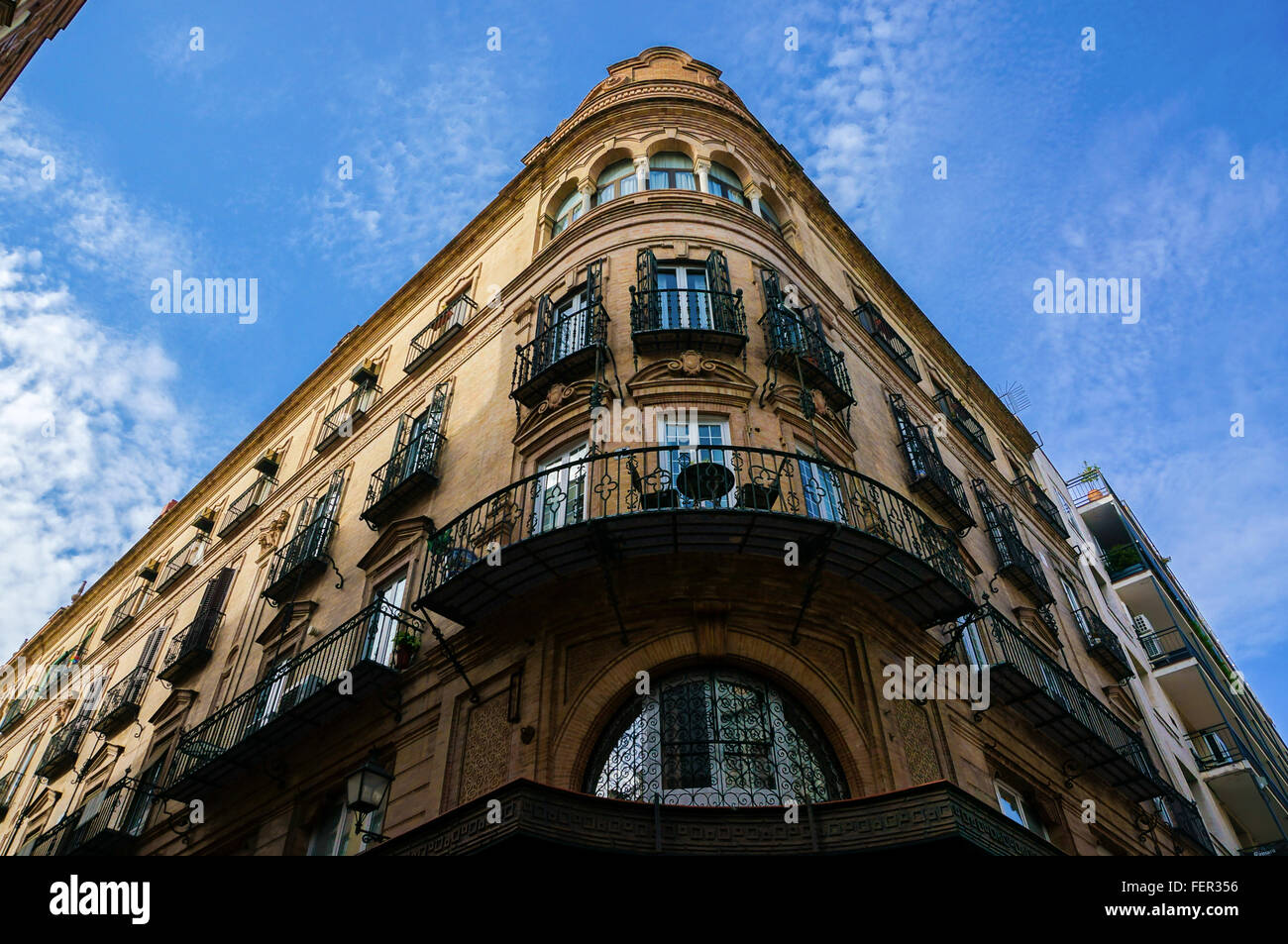 The building at the corner of the street Stock Photo - Alamy