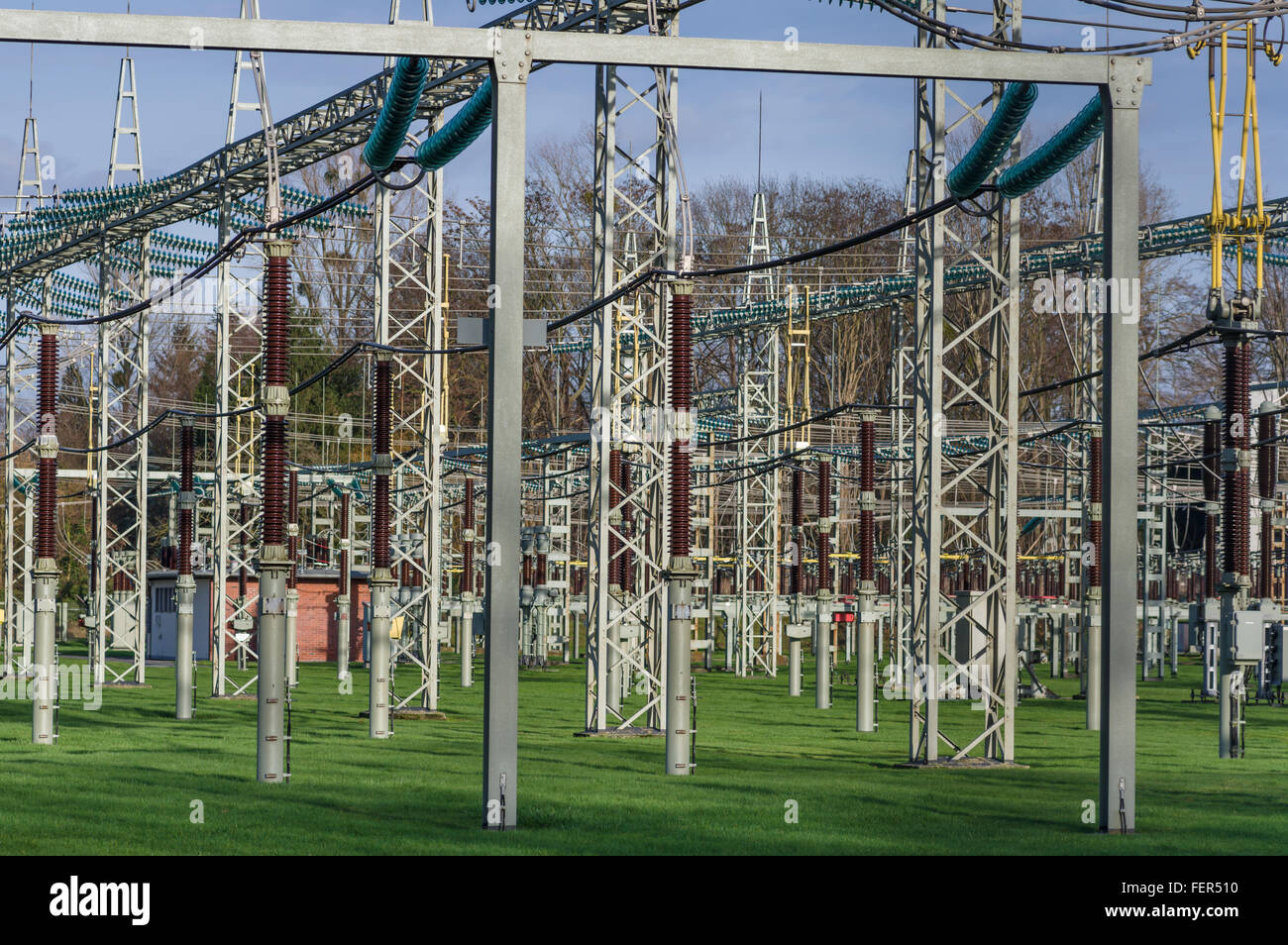 power plant with isolation objects in front of trees Stock Photo - Alamy