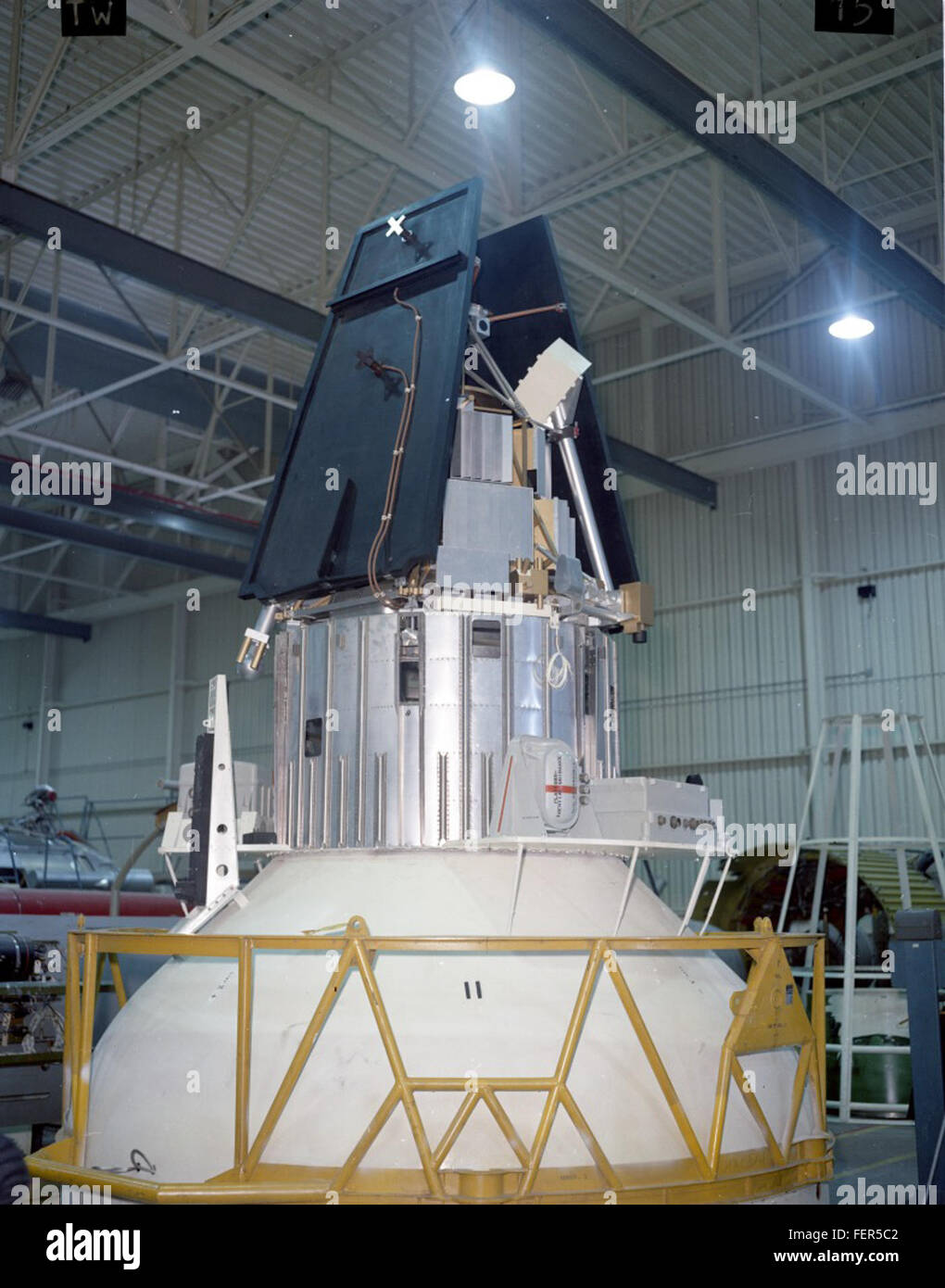 This image showcases a mockup of the Mariner A spacecraft attached to a ...