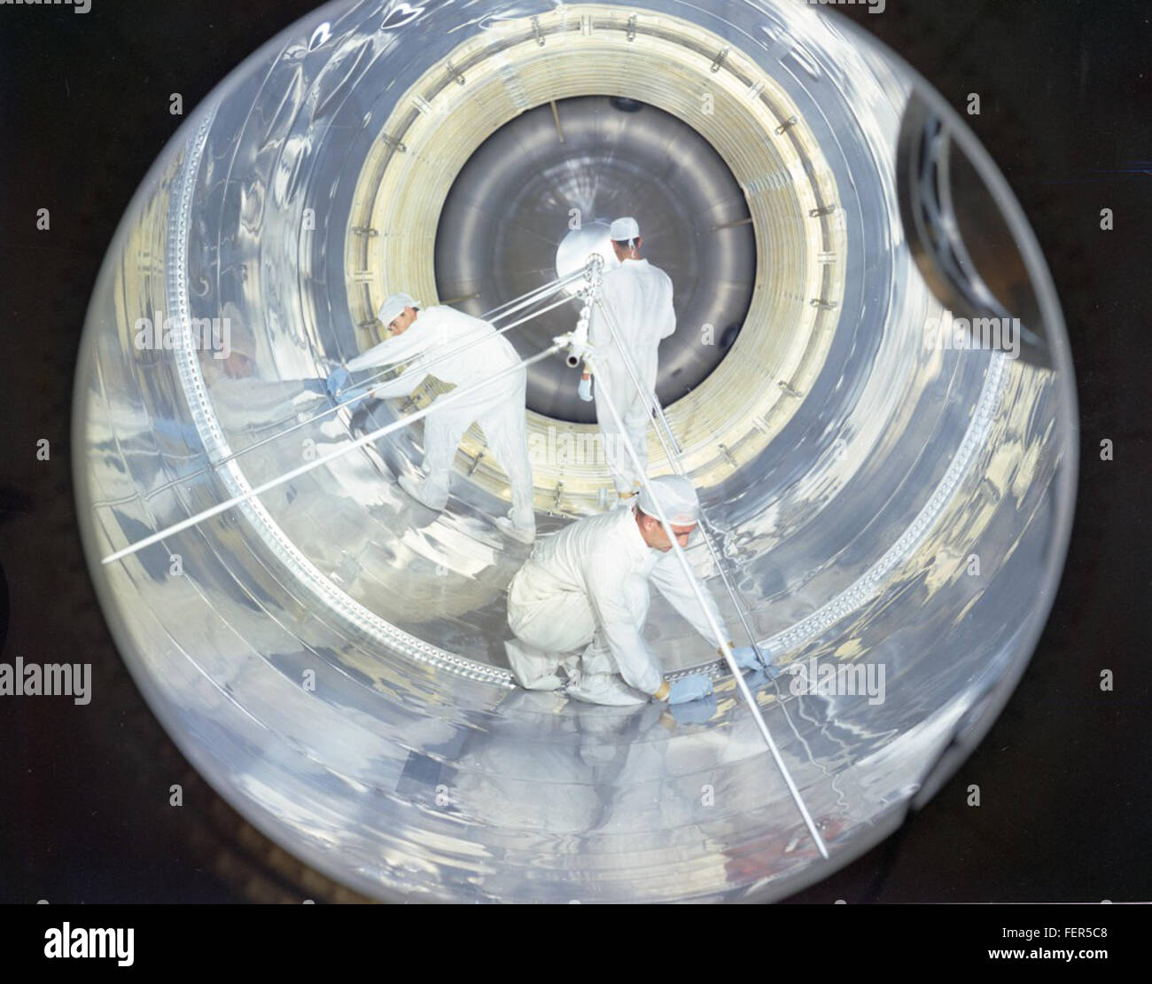 A detailed image showing three men working in a tank with the Stillwell ...