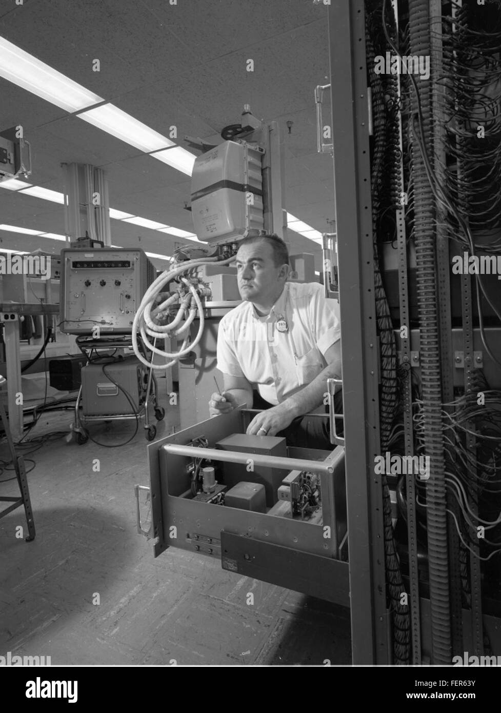 This image shows a general view of Building 33 at APCO, featuring a man ...