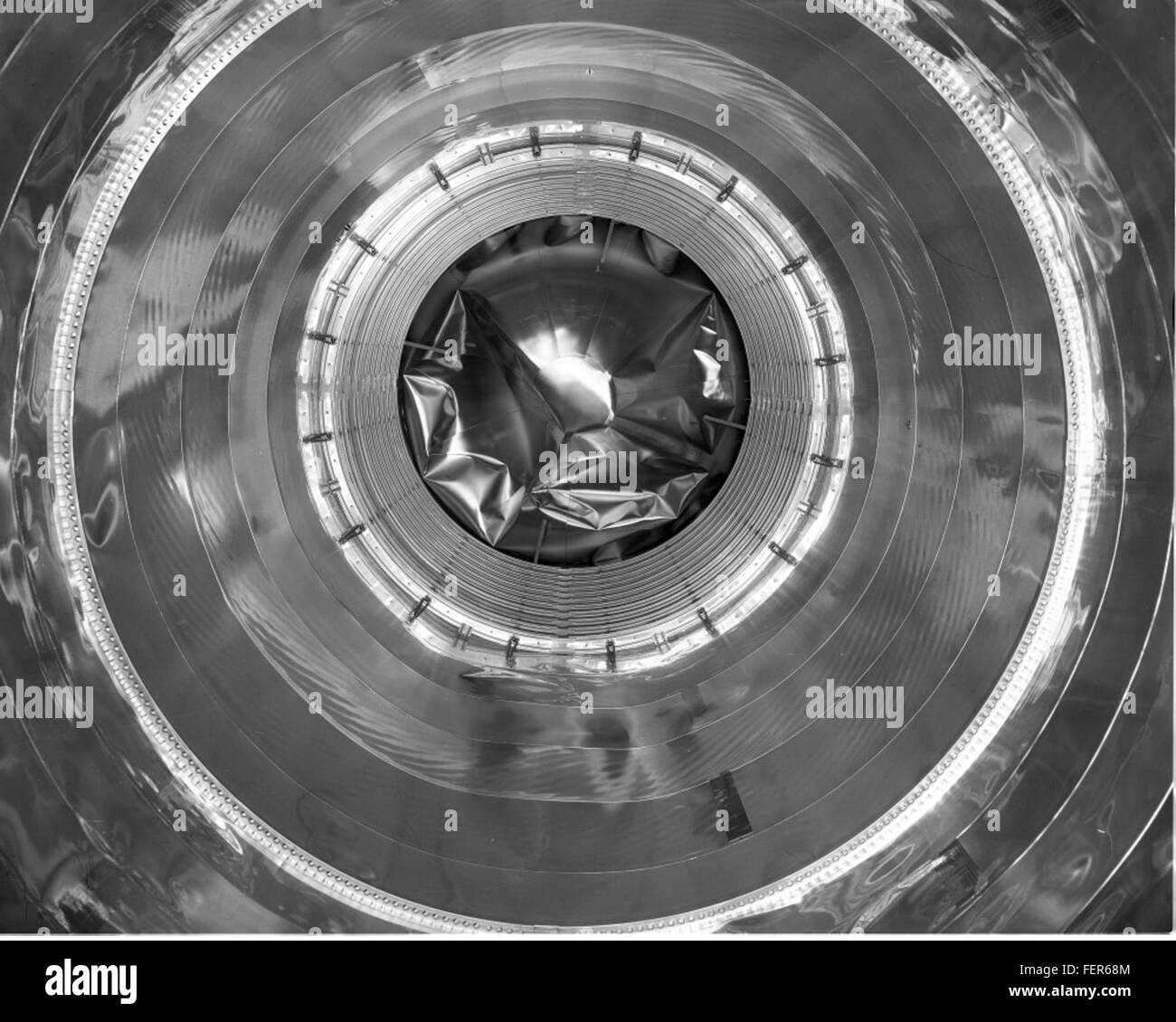 This technical image depicts damage to the fuel tank and nose cone of ...