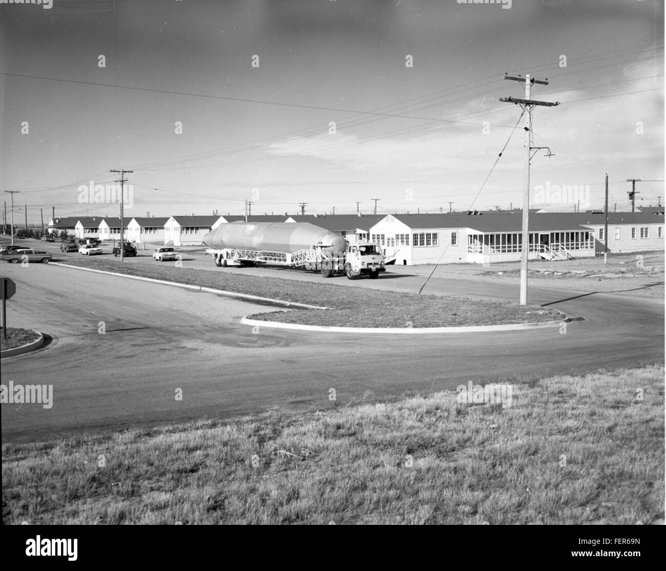 This photograph details the unloading of the Atlas 35D missile at ...