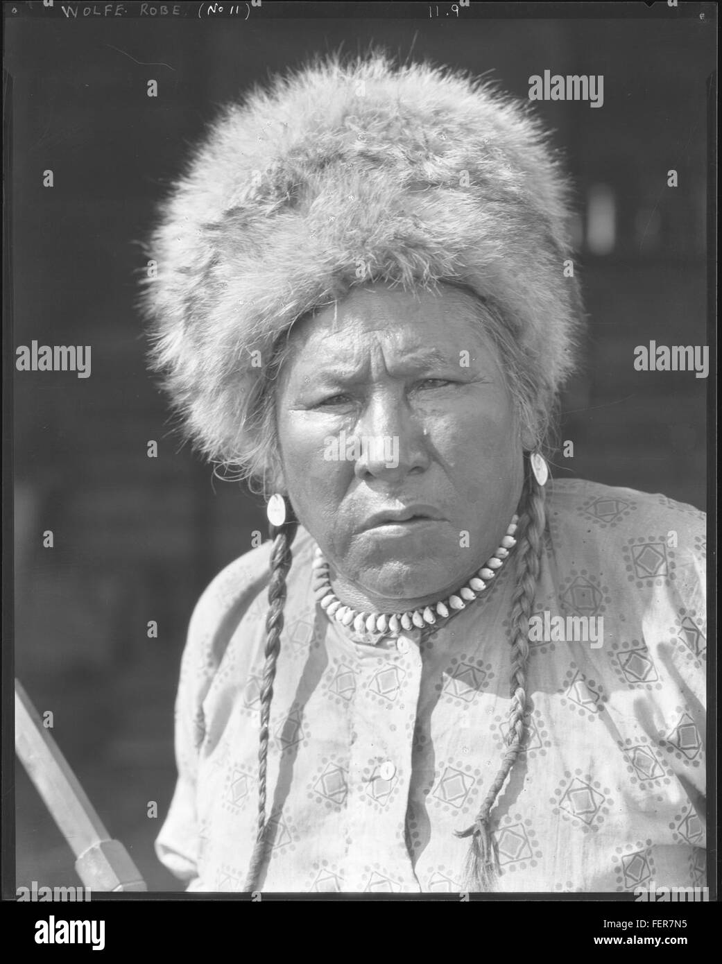 This portrait features Wolfe Robe, a prominent Native American leader ...
