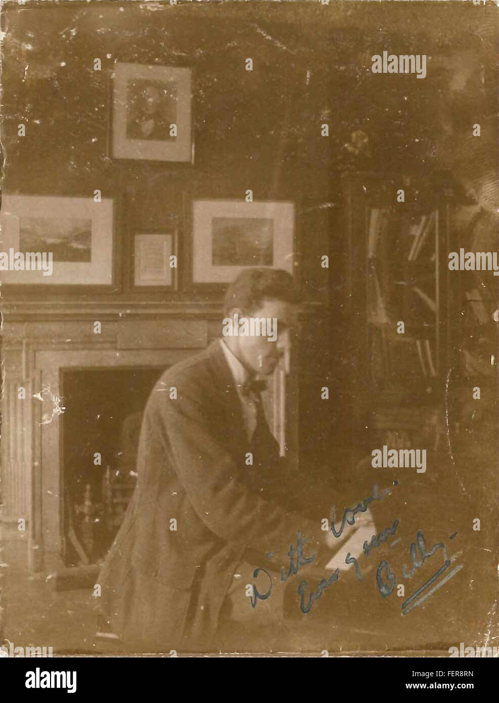 This image shows William Lovelock, a musician, playing the piano. It ...