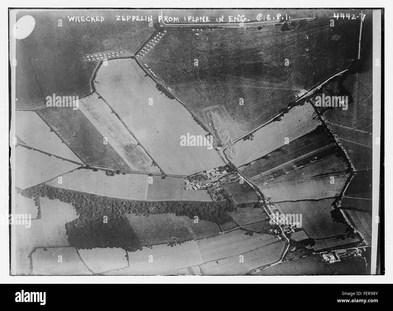 A historical photograph of a wrecked Zeppelin in England, showcasing ...