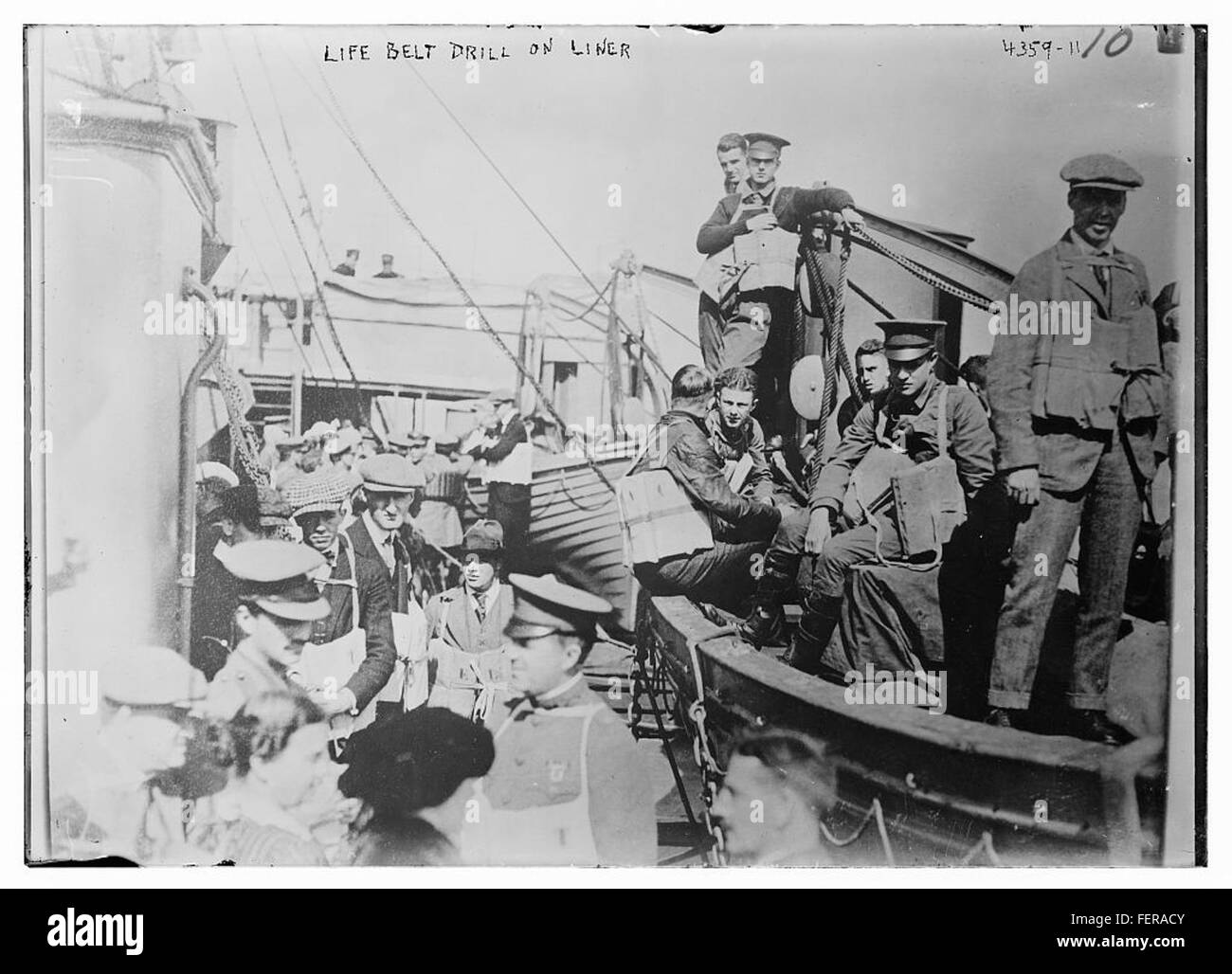 A life belt drill on a liner demonstrates safety procedures on board a ...