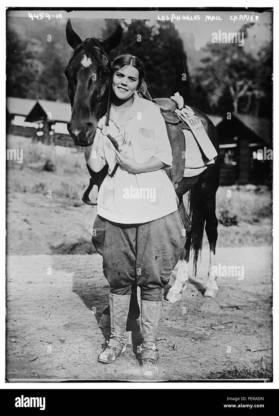 A photograph of a female mail carrier in Los Angeles, likely from the ...