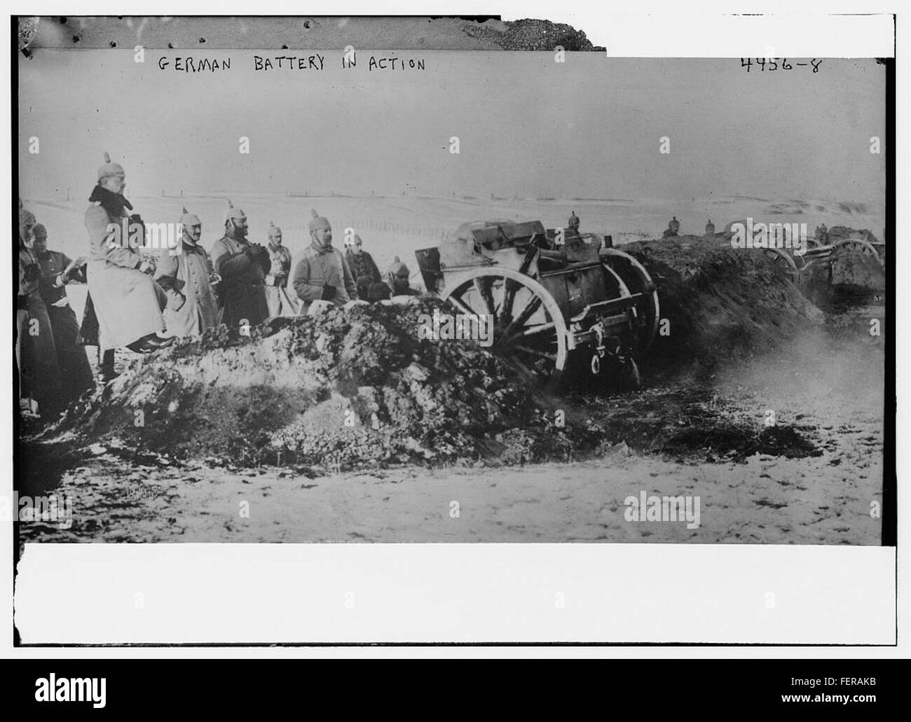 A photograph from World War II showing a German artillery battery in ...
