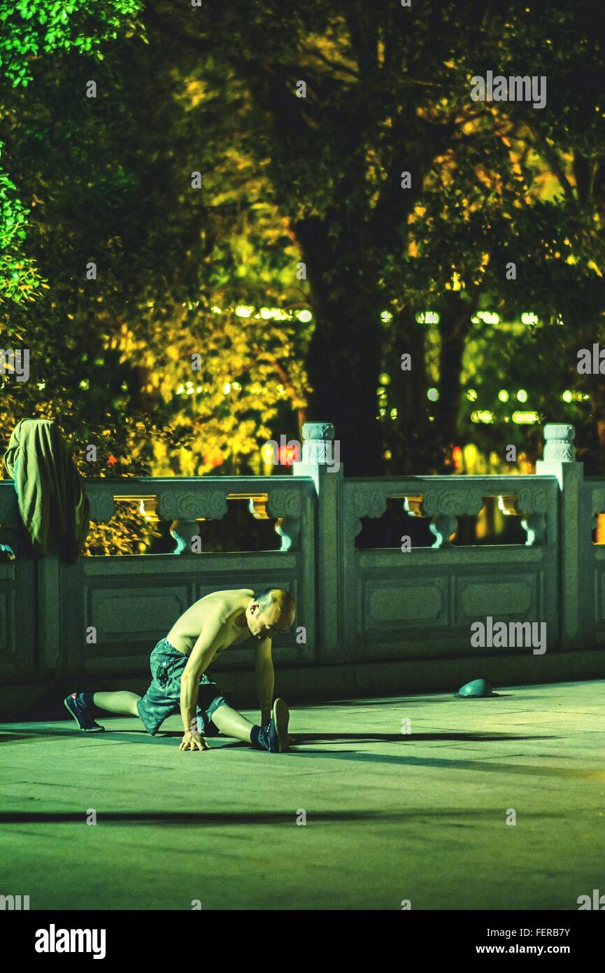 Man Doing Splits On Sidewalk Stock Photo - Alamy