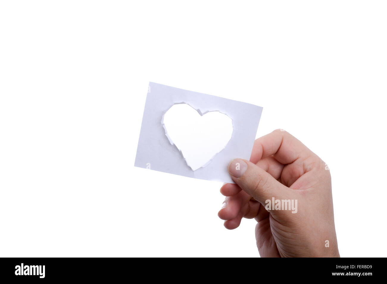 Hand holding a heart shaped paper Stock Photo - Alamy