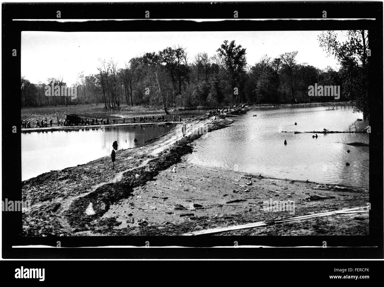 A historical image from 1913 showing workers building or maintaining a ...