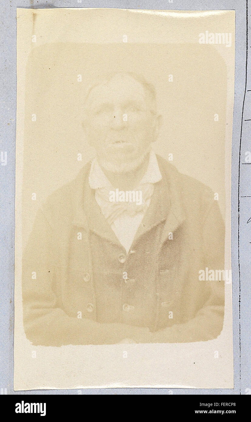 A historical photo showing a convict prison in Tasmania. The image is ...