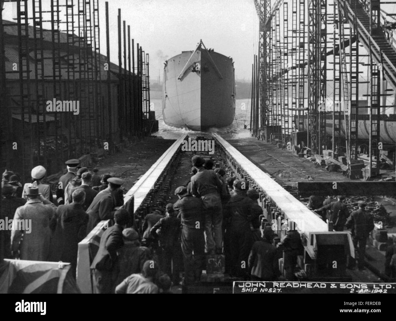 The image shows the launch of the cargo ship 'Empire Clough' from the ...