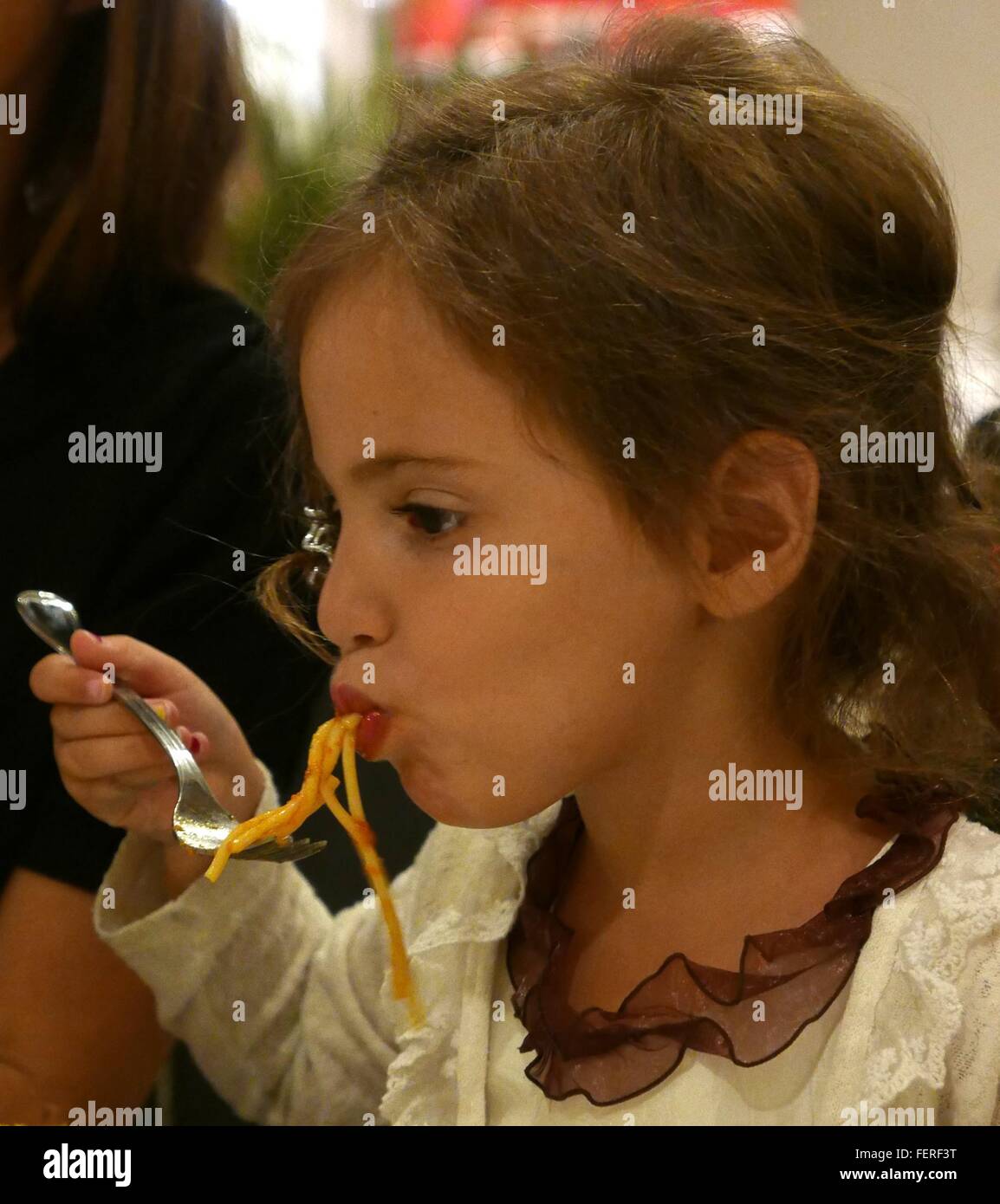 Girl spaghetti hi-res stock photography and images - Alamy