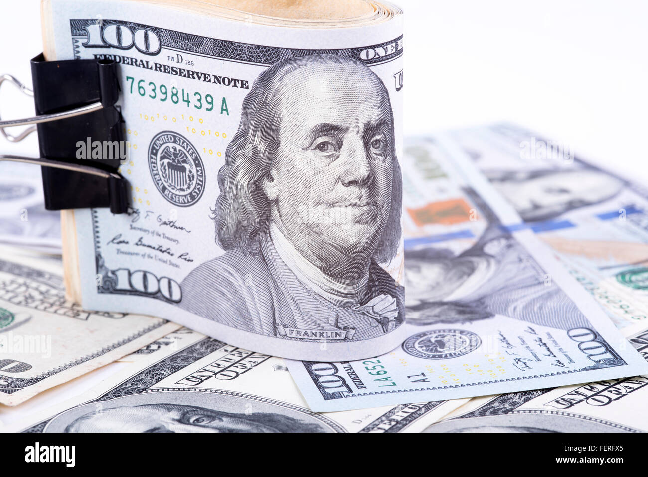 pictures of dollar banknotes on a white background Stock Photo - Alamy