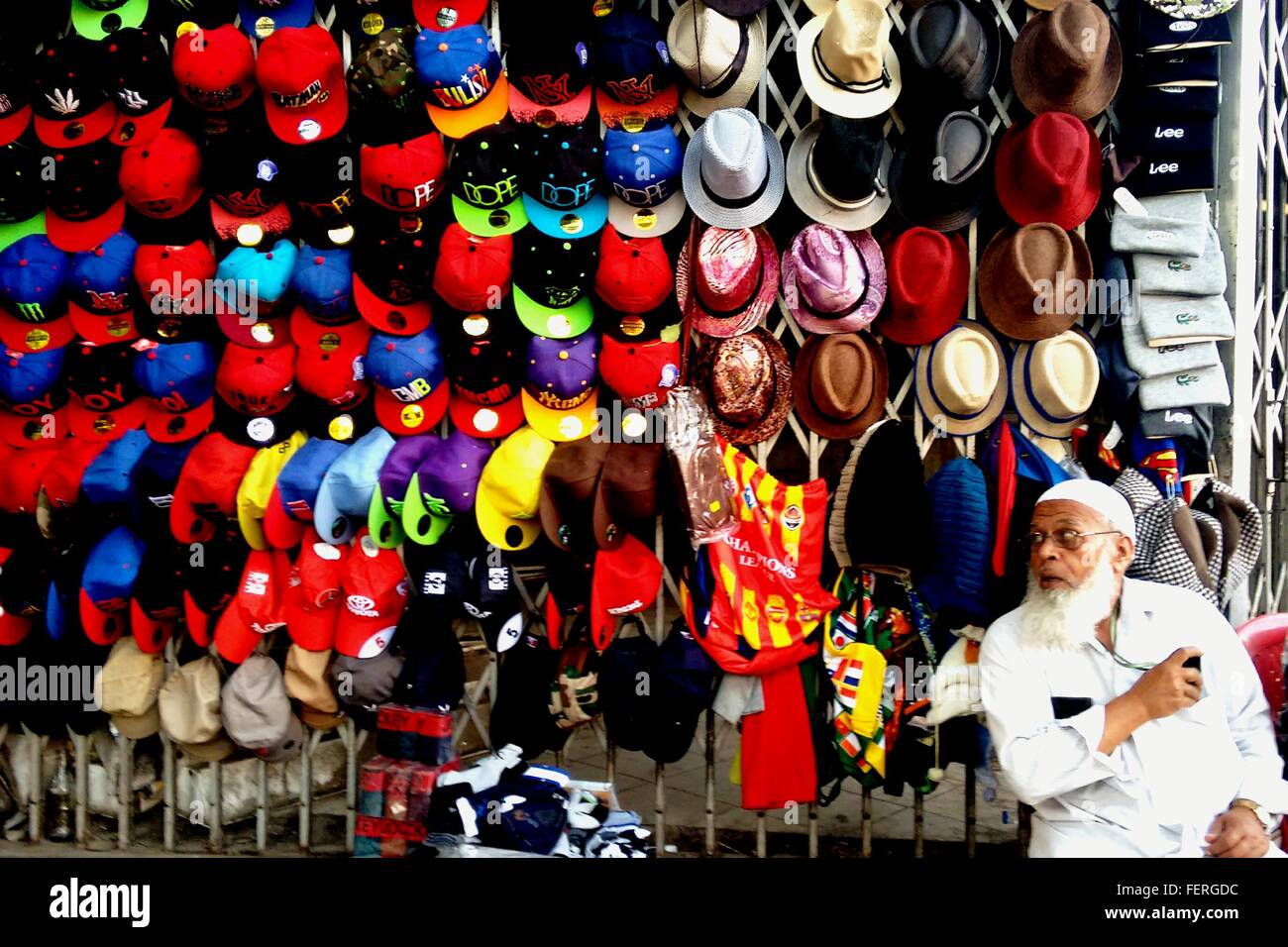 Market stall selling hats hi-res stock photography and images - Alamy