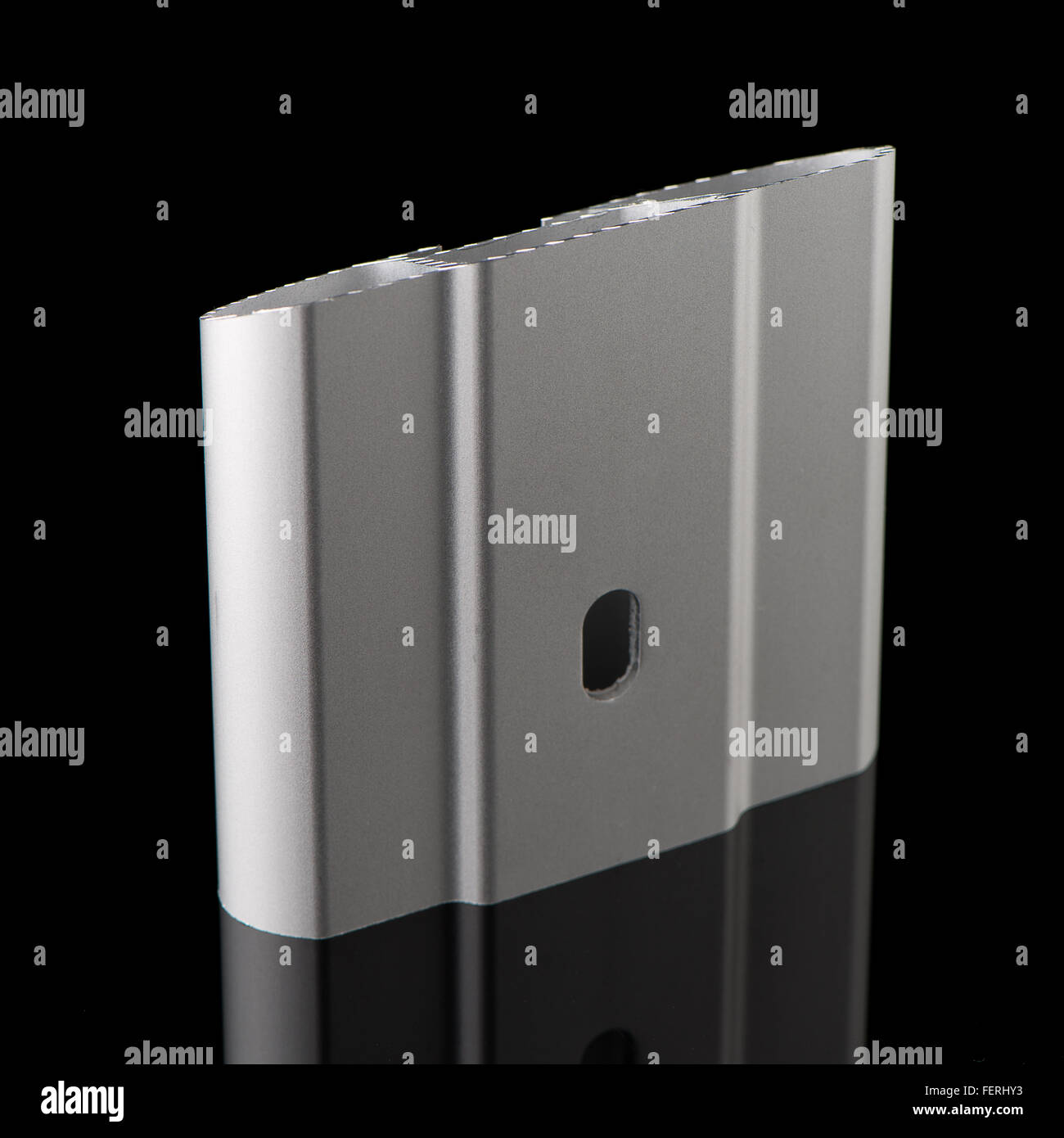 Aluminium profile sample isolated on black background Stock Photo - Alamy