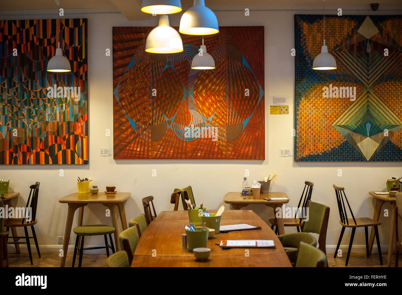 Trendy cafe displays art in Harringay, North London UK Stock Photo - Alamy