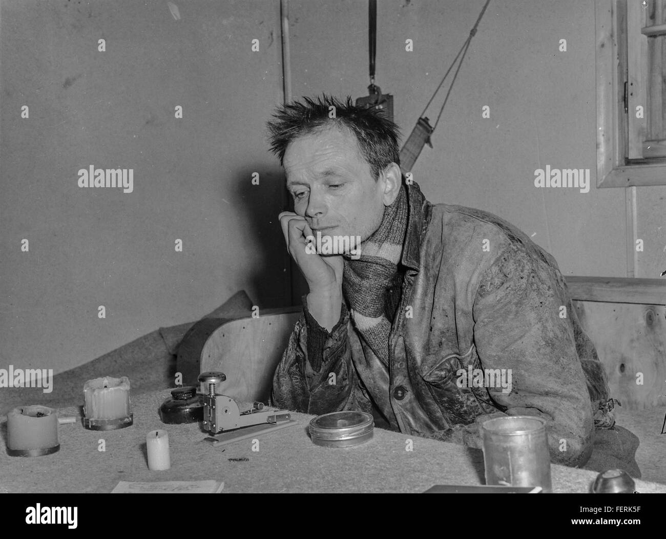 A historical photograph depicting the arrest of an informant during ...