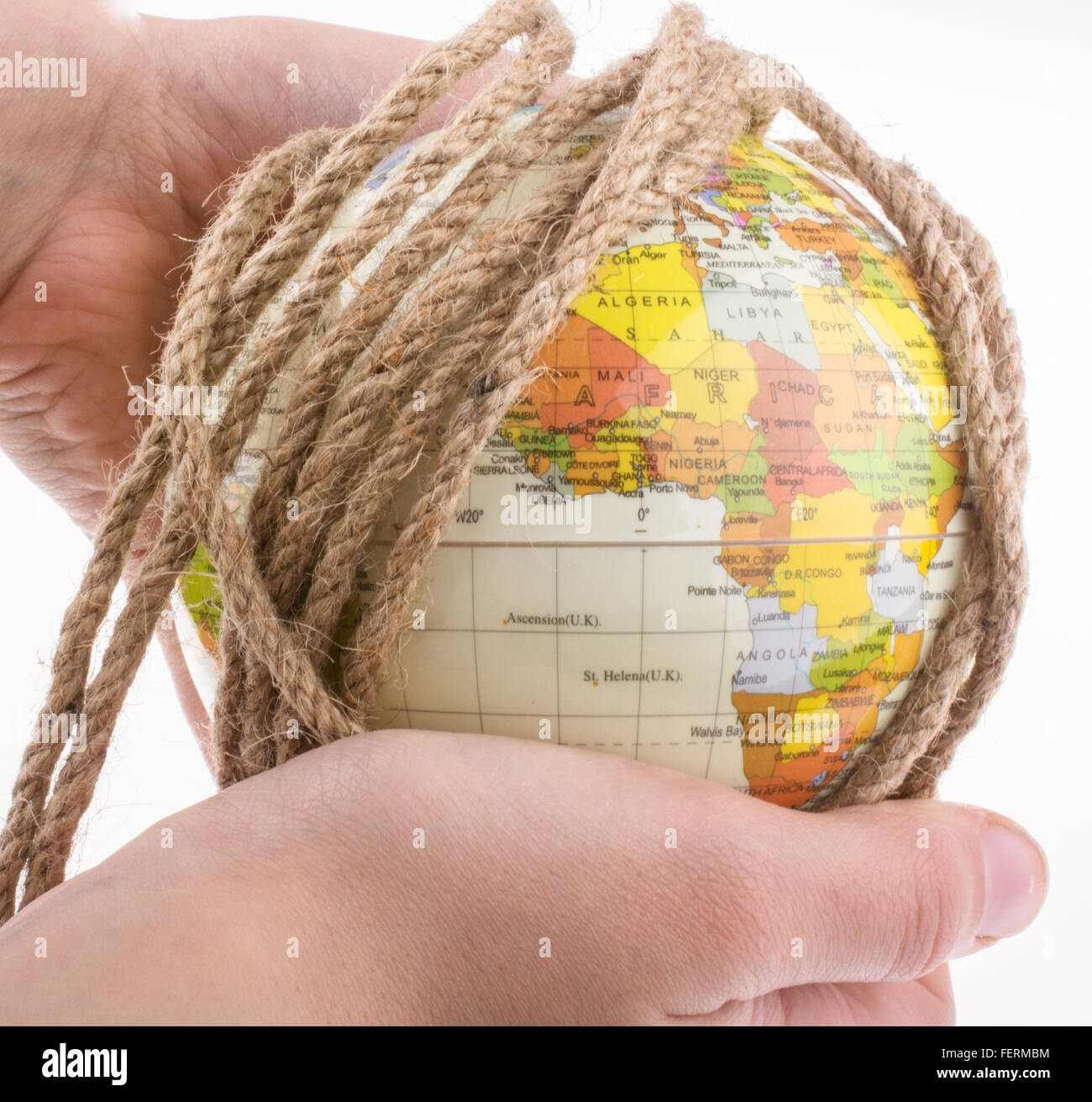 hands holding the globe wrapped in rope Stock Photo - Alamy