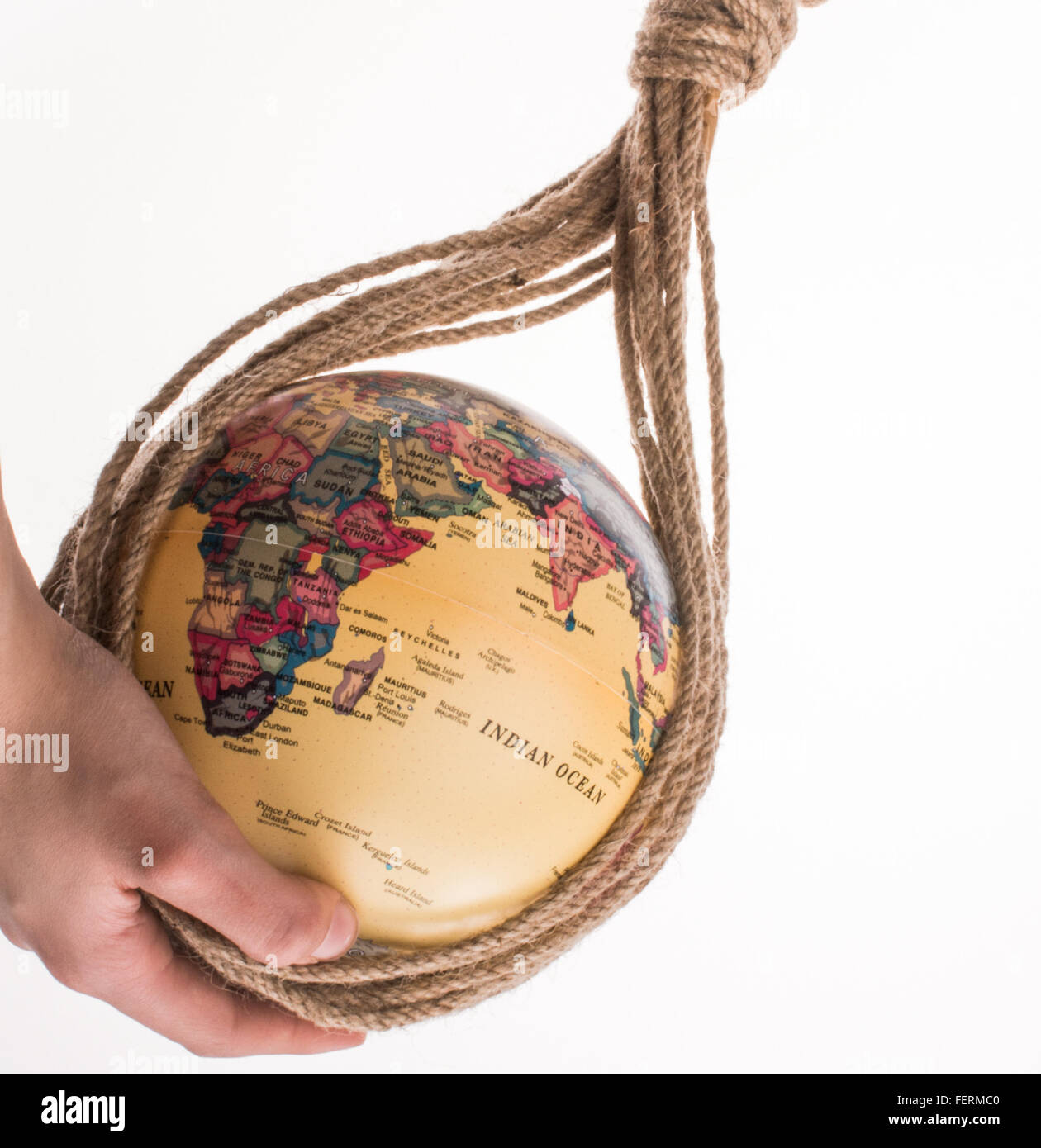 globe hanging in rope on white background Stock Photo - Alamy