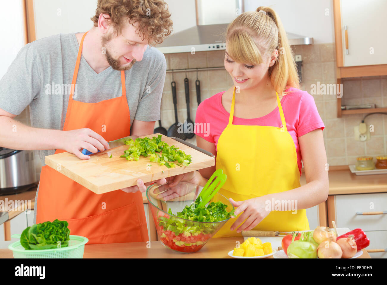 Healthy eating, vegetarian food, cooking, dieting and people concept ...