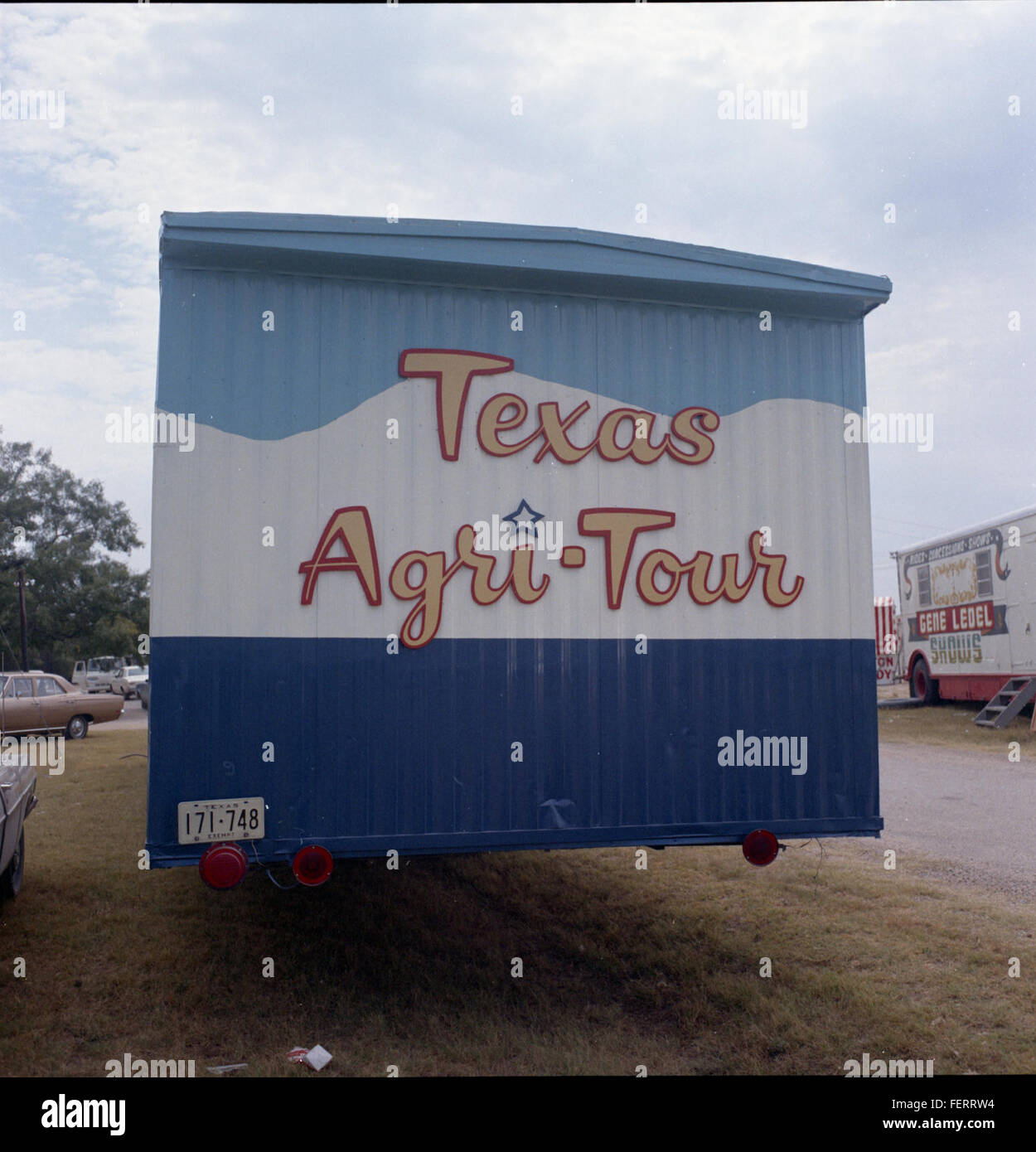 A photograph of an Agri-Tour van, likely used in agricultural tours or ...