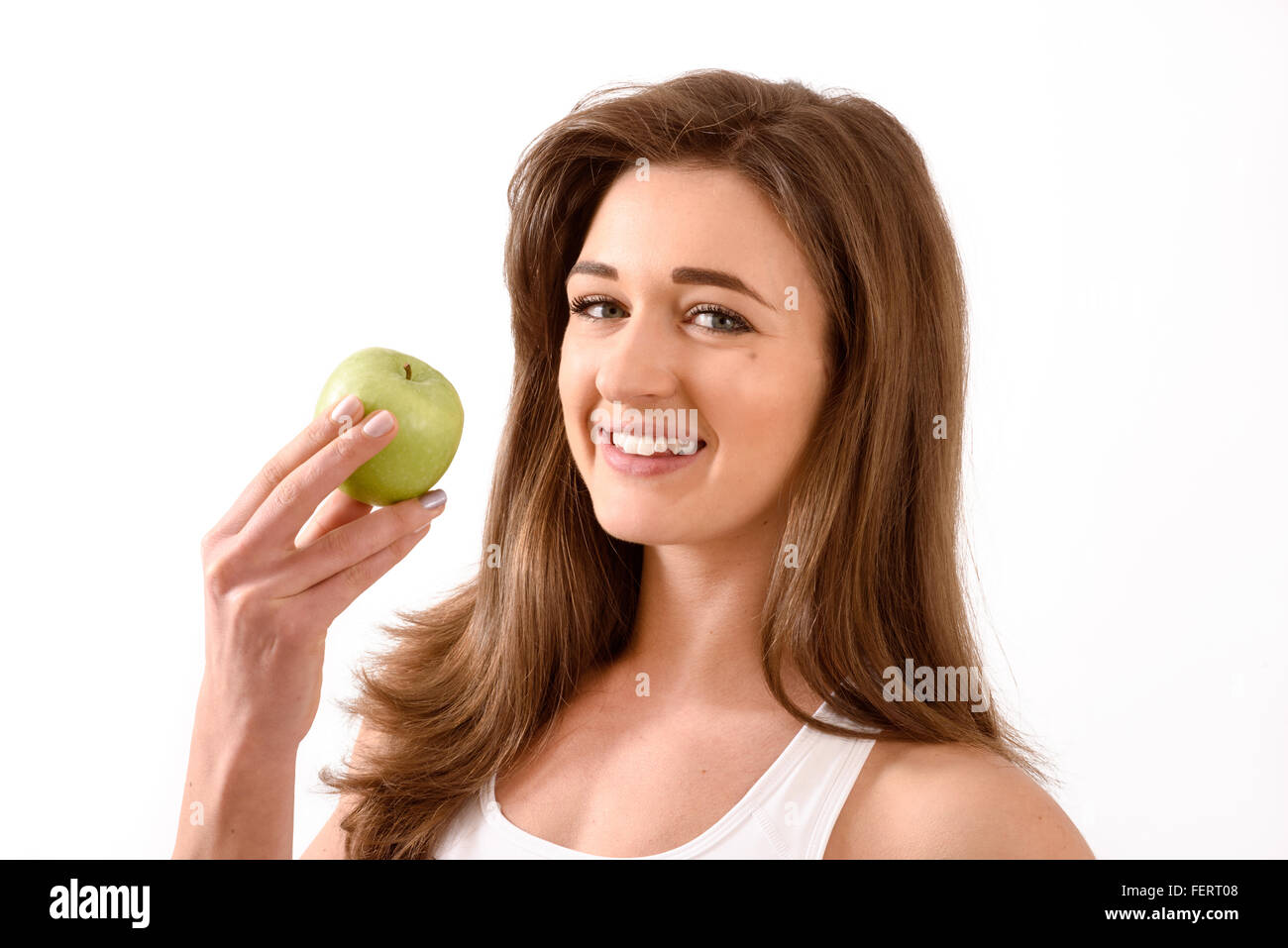 Young caucasian woman with apple Stock Photo - Alamy