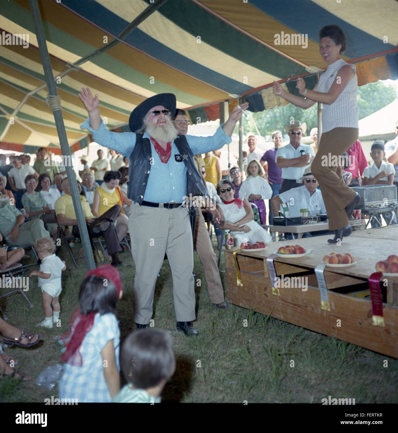 This image captures the Peach Jamboree in Stonewall, Texas, in 1970, a ...