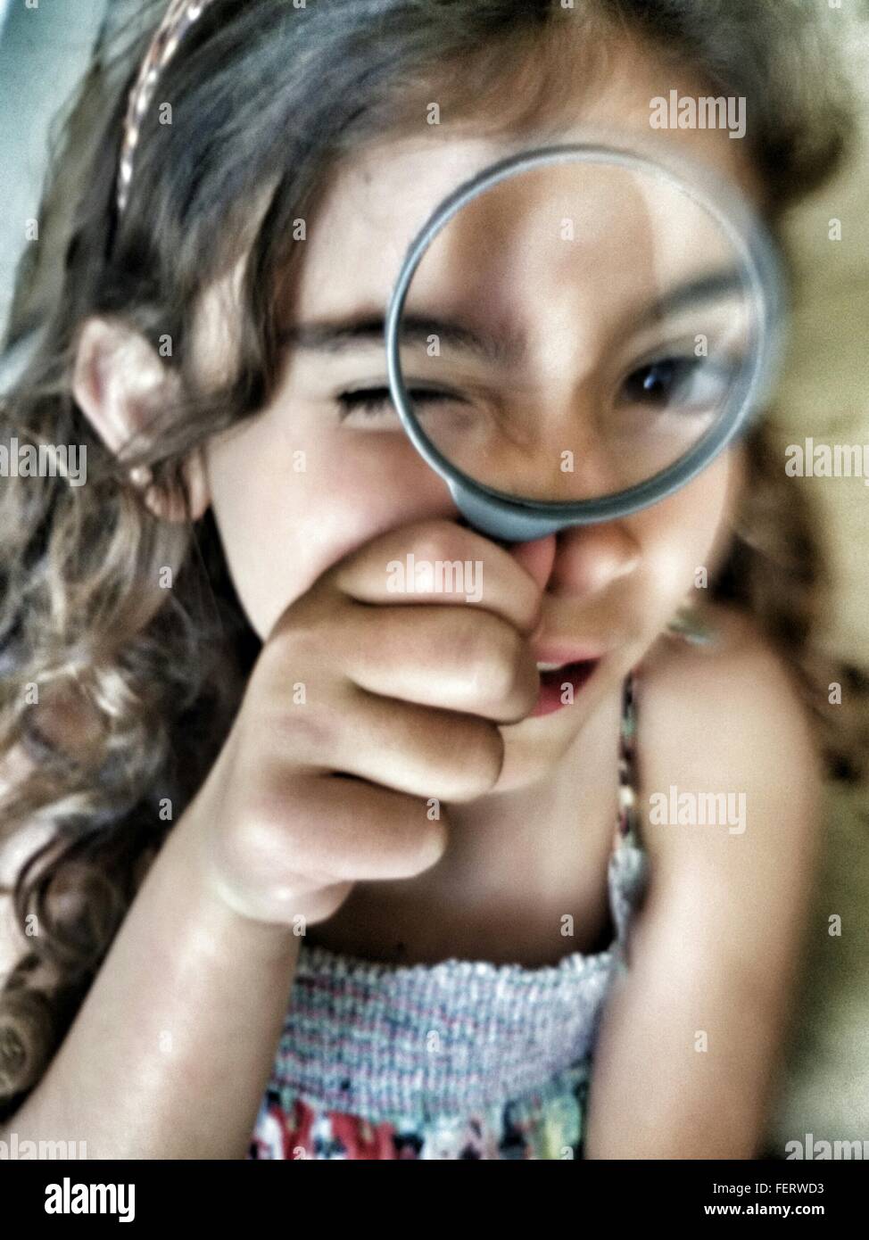 Looking with magnifying glass hi-res stock photography and images - Alamy