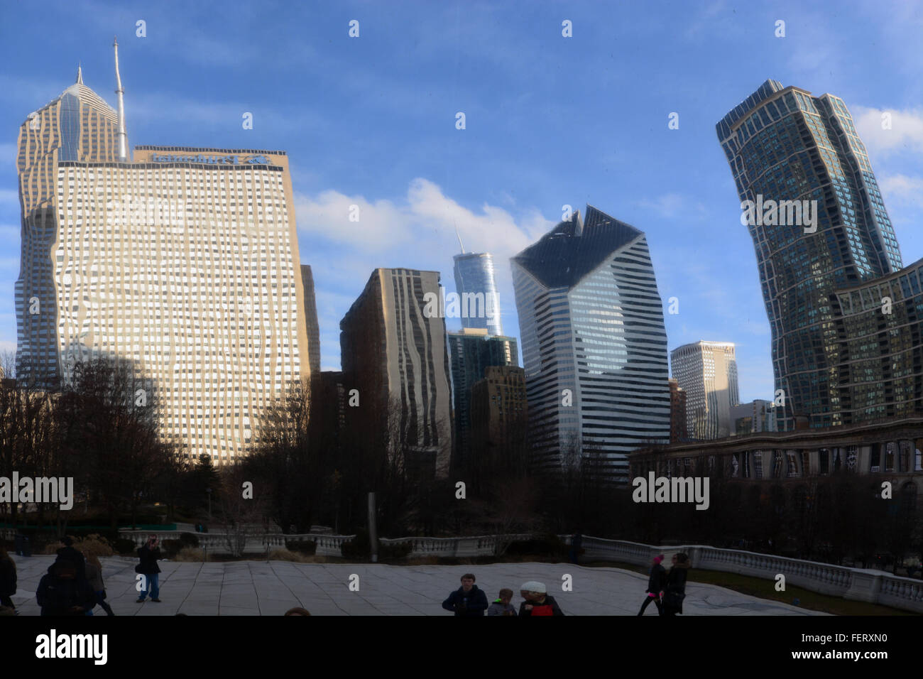 The distorted city skyline is reflected in Cloud Gate also known as The ...