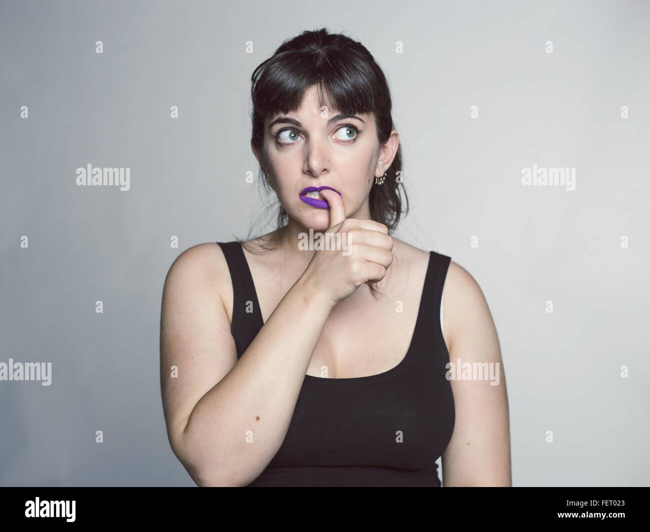 Fingernail biting hi-res stock photography and images - Alamy