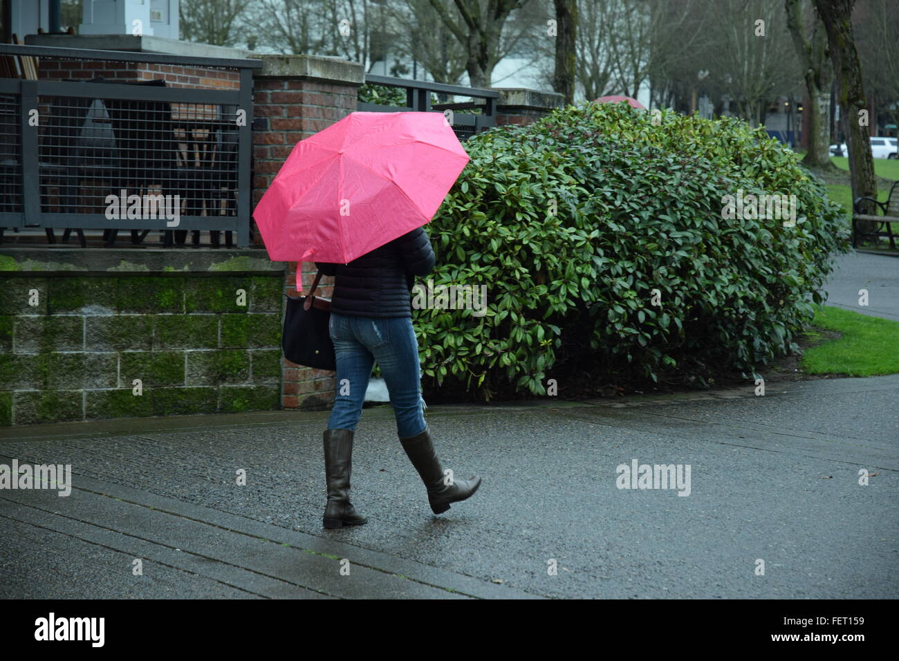 Woman umbrella walking hi-res stock photography and images - Alamy