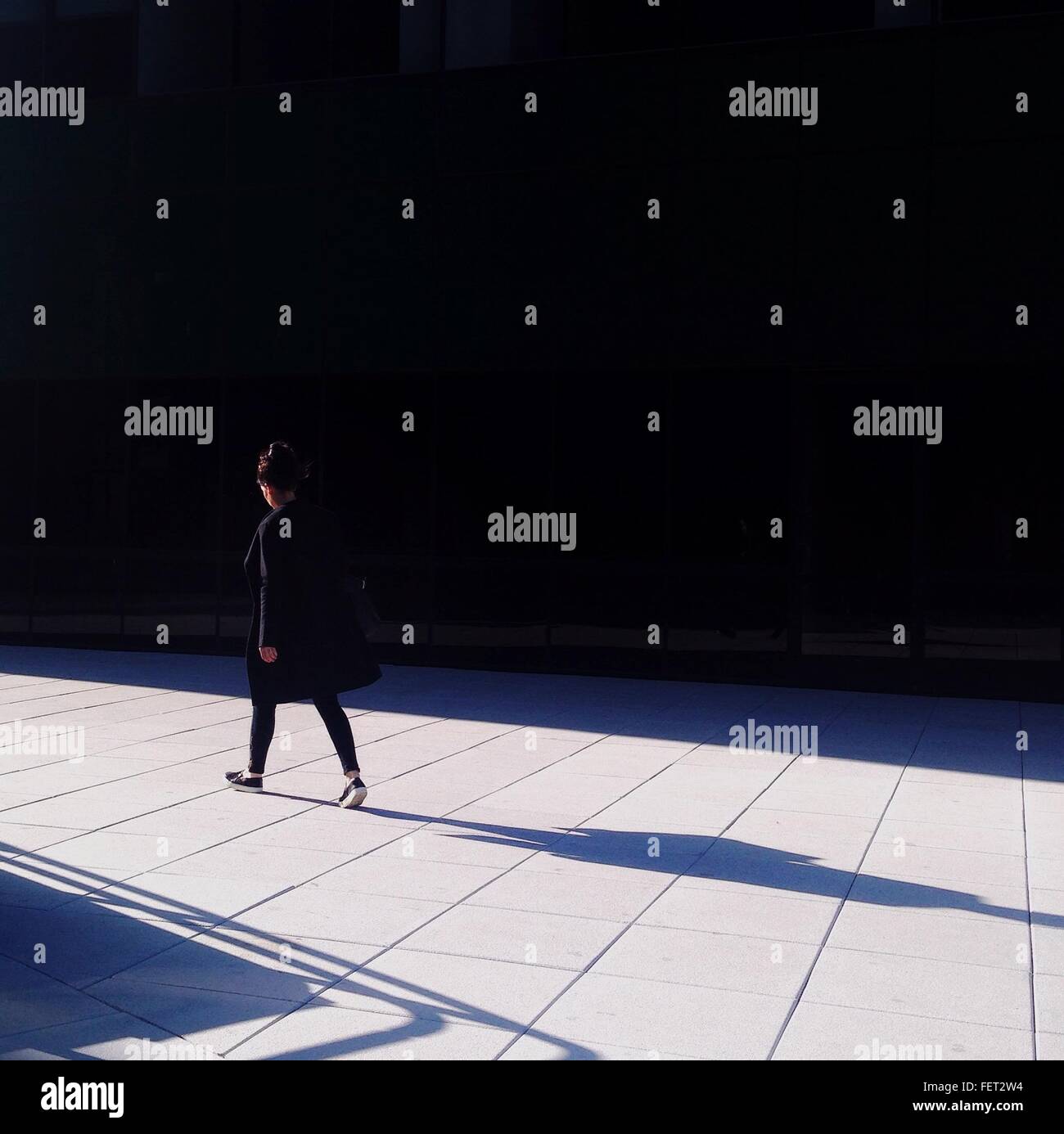 Side view woman walking on hi-res stock photography and images - Alamy