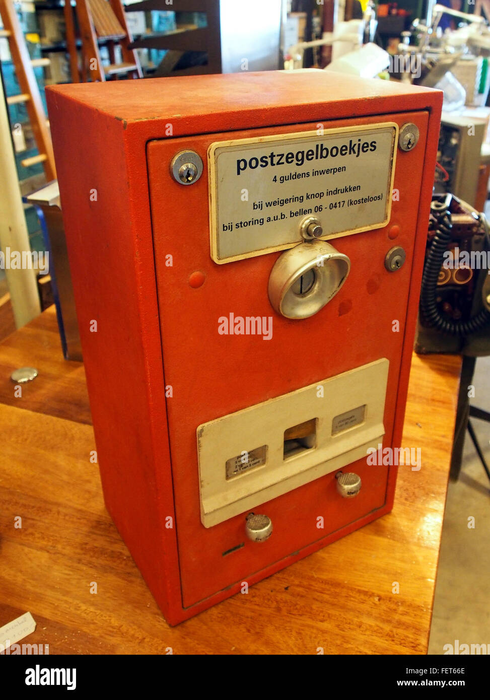 An old stamp book vending machine is displayed, showcasing the ...