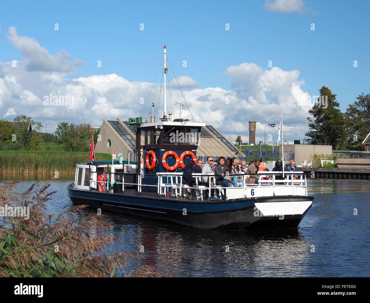 The vessel ENI 03800113 is docked at Kinderdijk, known for its historic ...