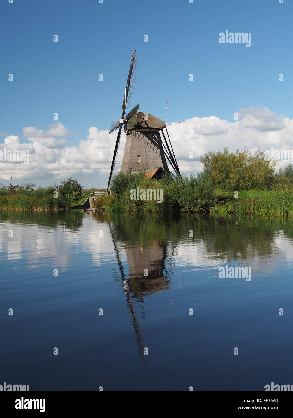 A Dutch windmill at Kinderdijk is one of the iconic water management ...