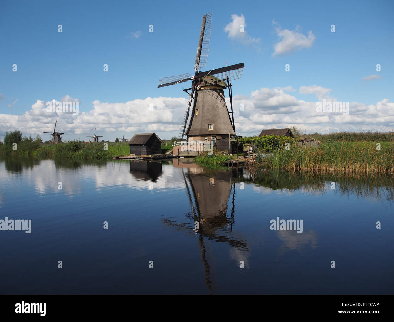 A traditional Dutch windmill stands at Kinderdijk, a UNESCO World ...