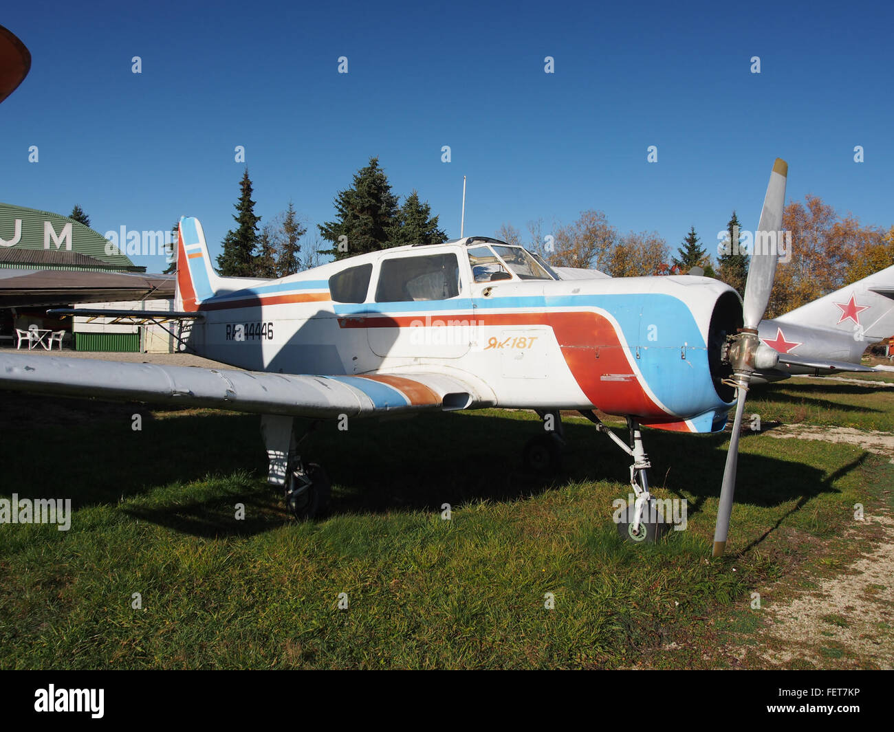 RA-44446, a YAK-18 aircraft, is shown in flight. The YAK-18 is a Soviet ...