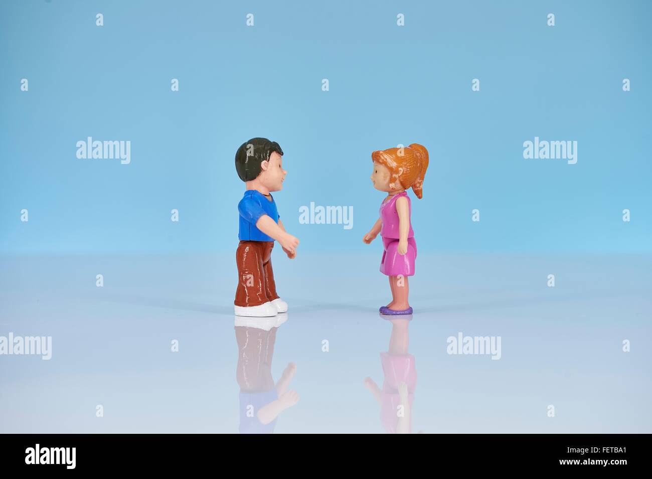 A studio photo of miniature toy people Stock Photo - Alamy