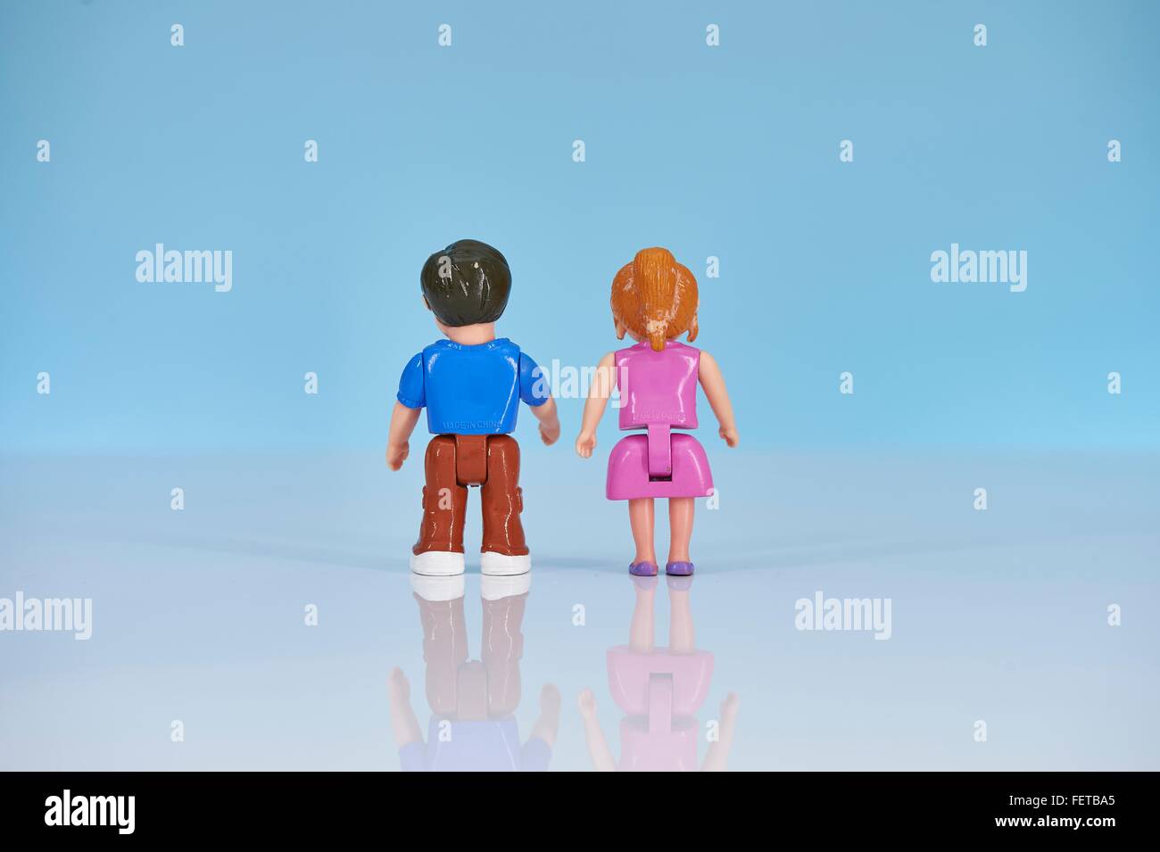 A studio photo of miniature toy people Stock Photo - Alamy