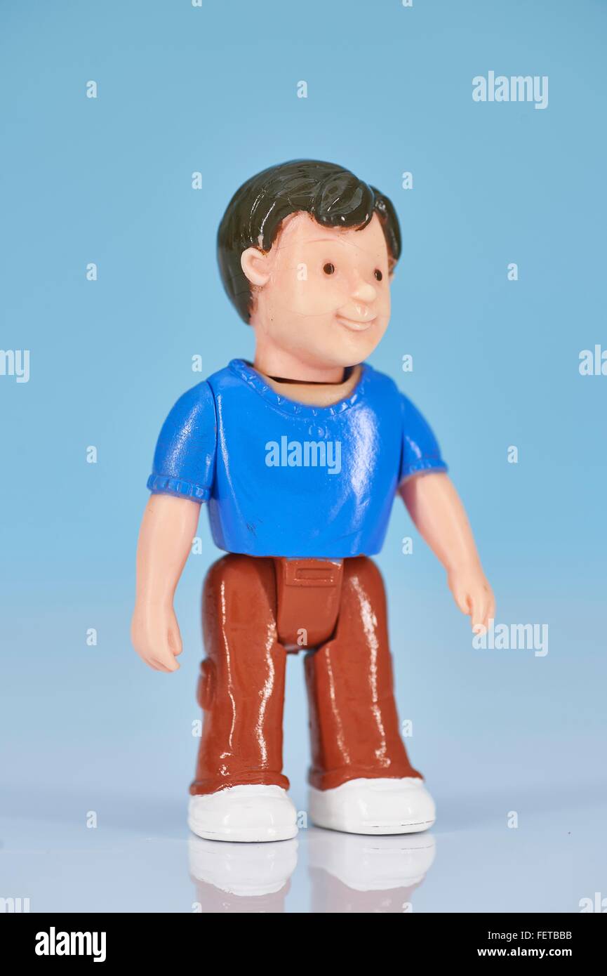 A studio photo of miniature toy people Stock Photo - Alamy