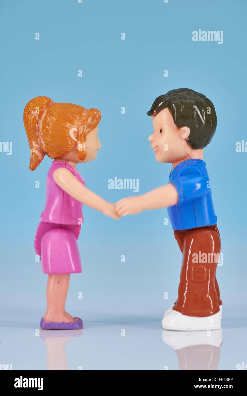 A studio photo of miniature toy people Stock Photo - Alamy